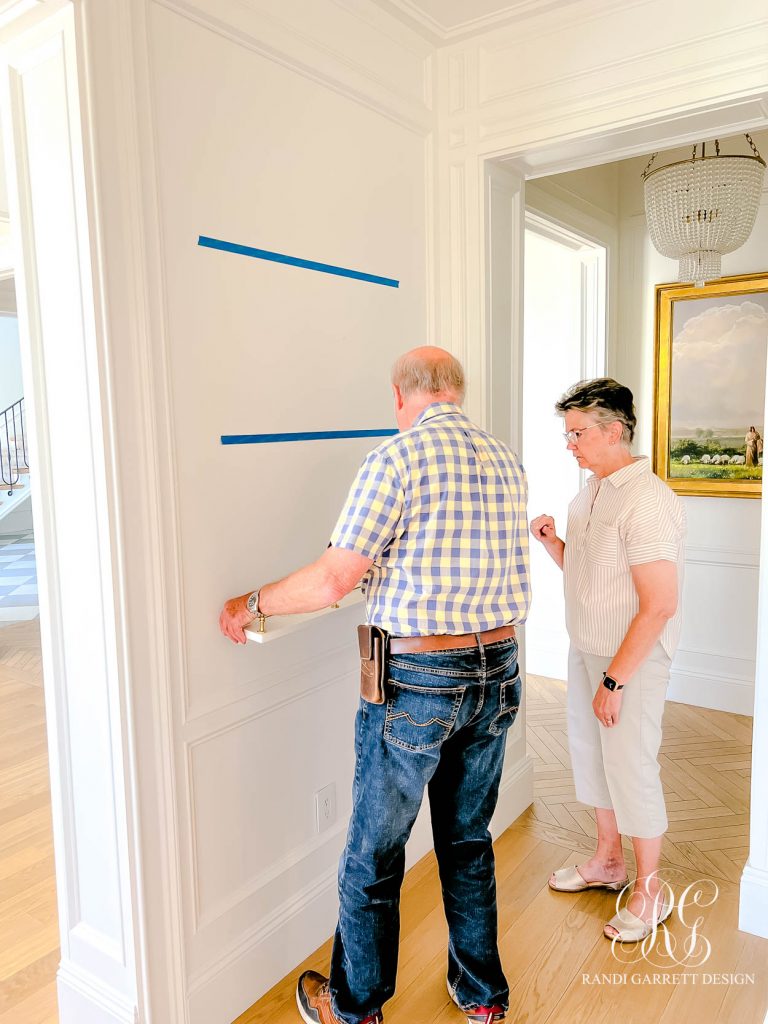 French-Style Shelves with Brass Tipping Rails - Randi Garrett Design