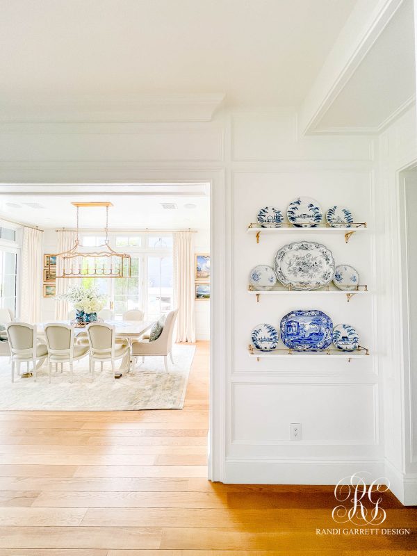 French-Style Shelves with Brass Tipping Rails - Randi Garrett Design