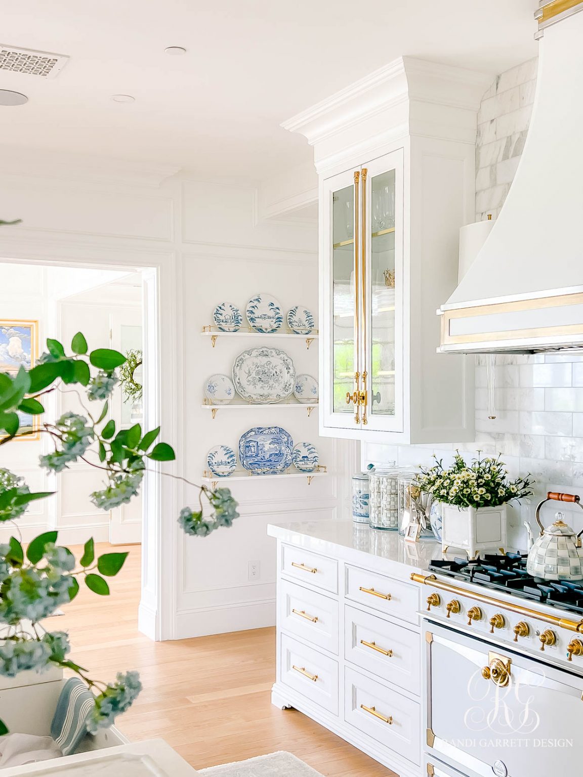 French-Style Shelves with Brass Tipping Rails - Randi Garrett Design